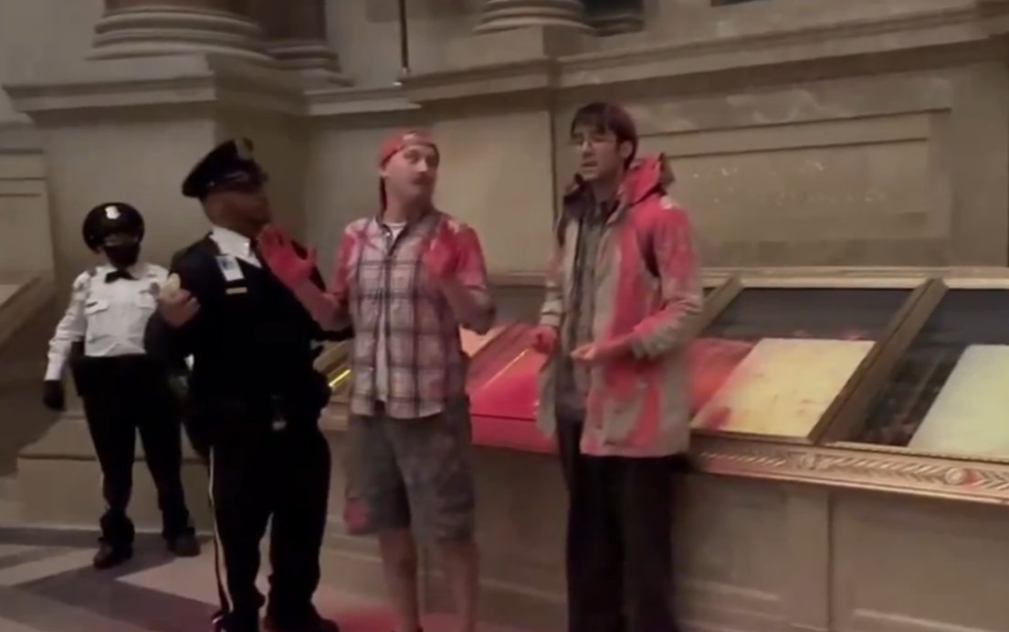 Climate Change Protestors Dump Pink Powder on Display Case that holds ...